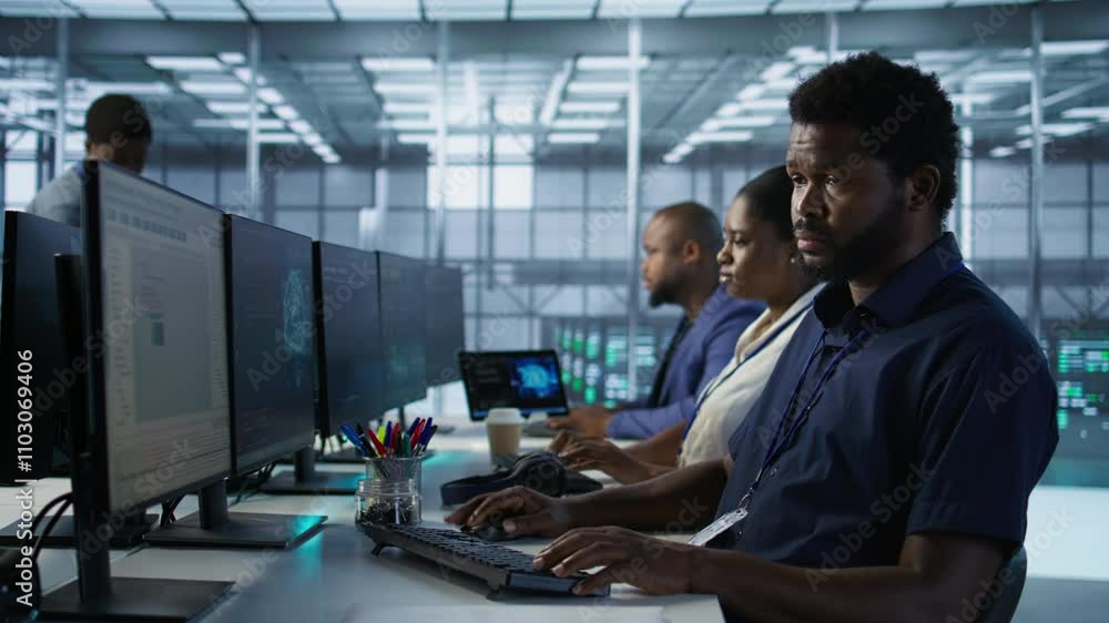 Developers in data center workspace implementing AI predictive maintenance systems. Admin in ...