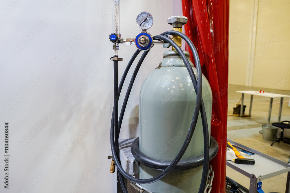 Cylinder with welding mixture. Steel tank with hoses and mechanical ...