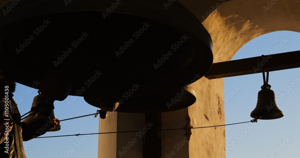 Bell ringing at sunset announces prayer time for Christian faithful ...