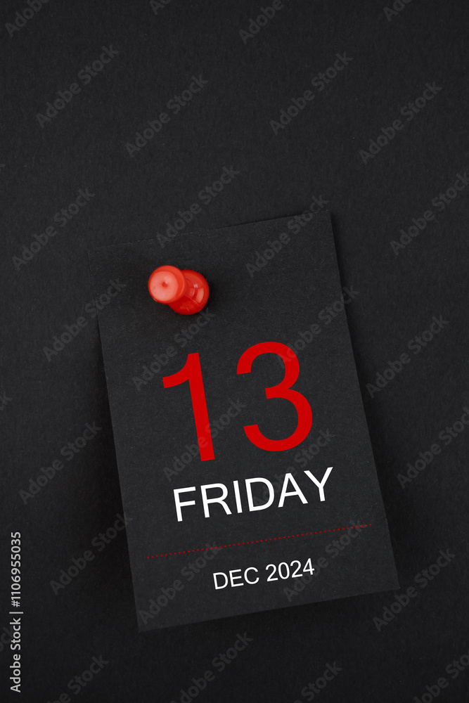 Calendar Friday the 13th December 2024 and push pin on black background ...