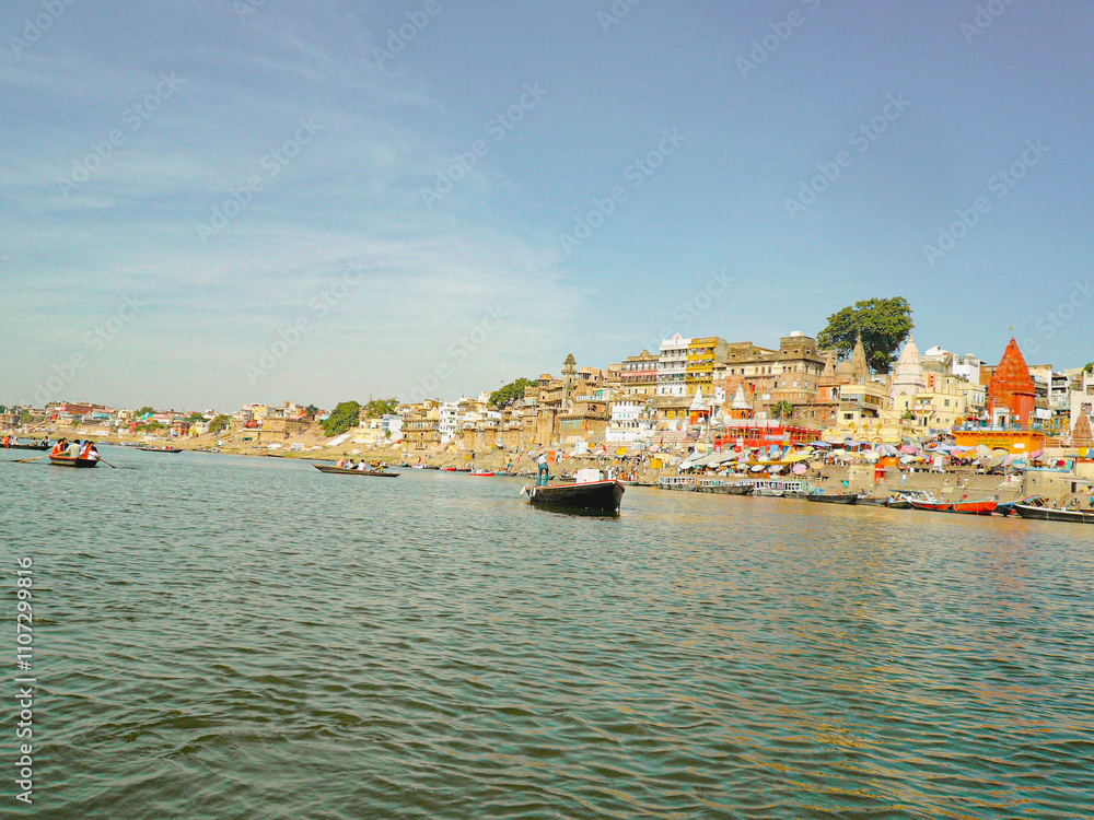 Historic Varanasi city with ancient architecture and tourist boats ...
