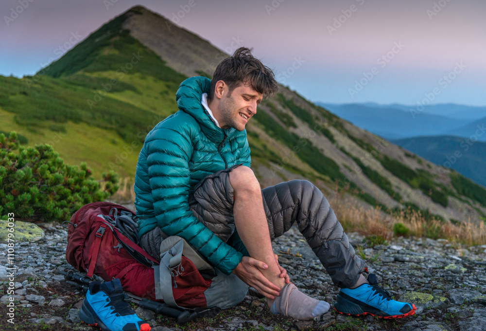 Man is Traveling with Backpack and has Problems with Sprained Ankle in ...