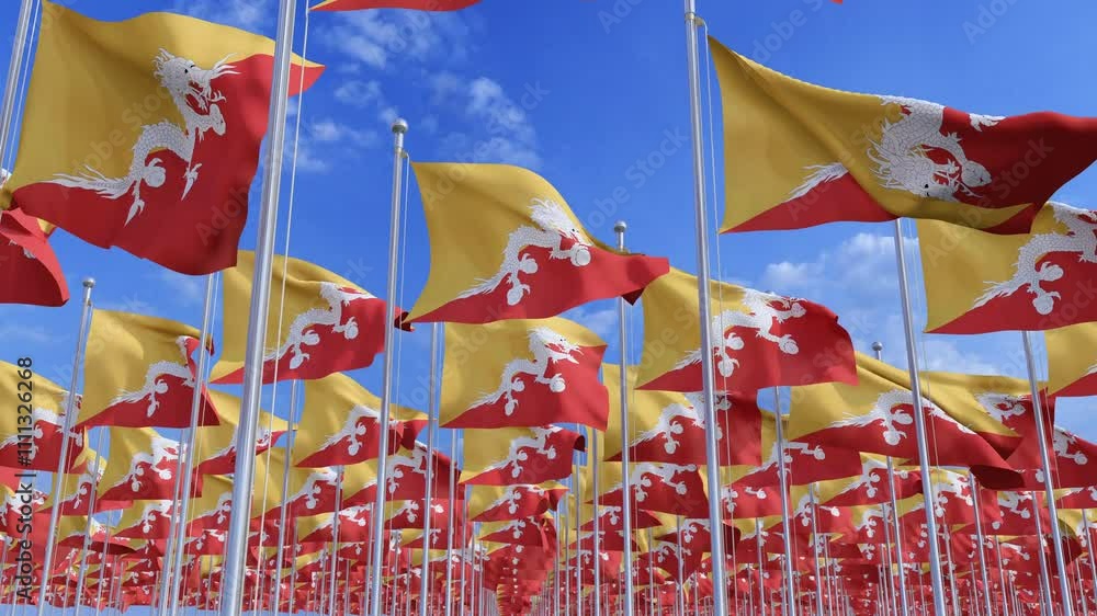 Fluttering Bhutan flags on blue sky background. Prosperity concept. The ...