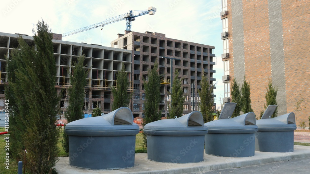 large closed containers for collecting and storing household waste in ...