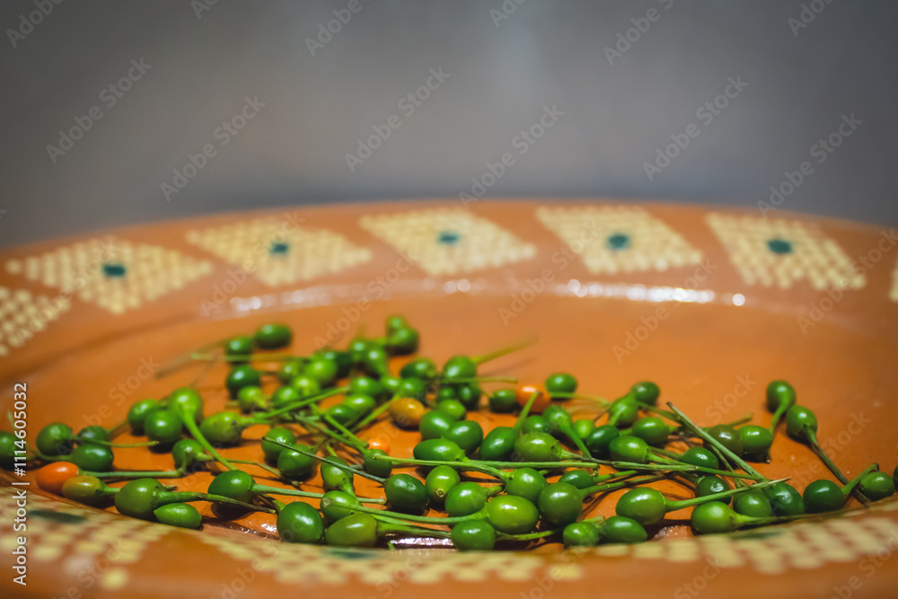 Foto de Artisan plate with Chiltepín, Chiltepe in Nahuatl, also known ...