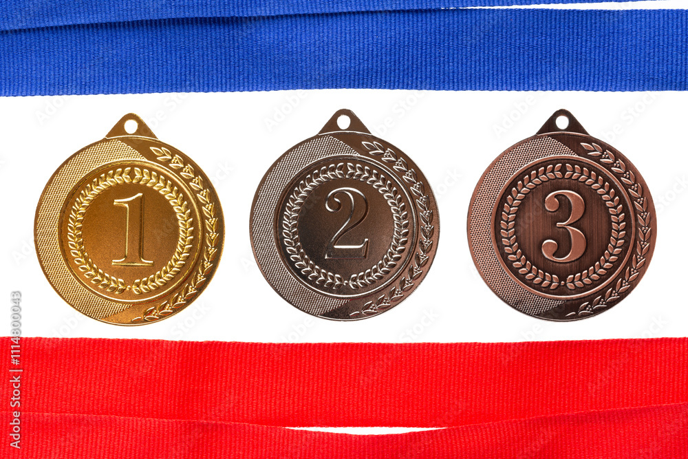Three medals gold, silver and bronze with blue and red ribbons isolated ...