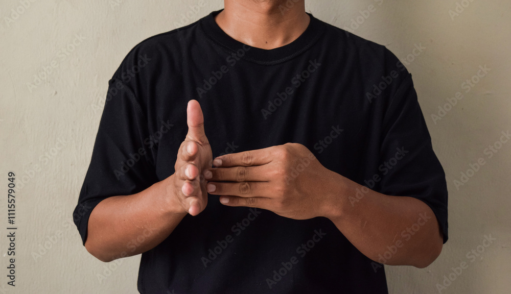 Sign Language man interpreter gesturing in sign language on gray ...