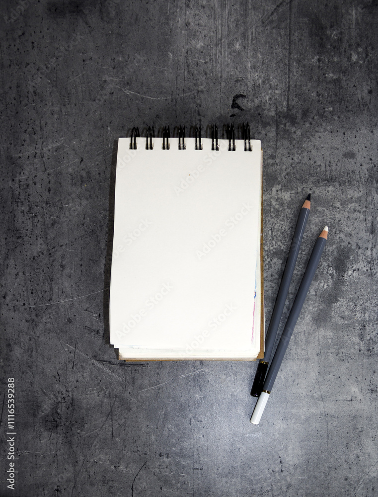 Notebook mockup on a black background, free space for your design and ...