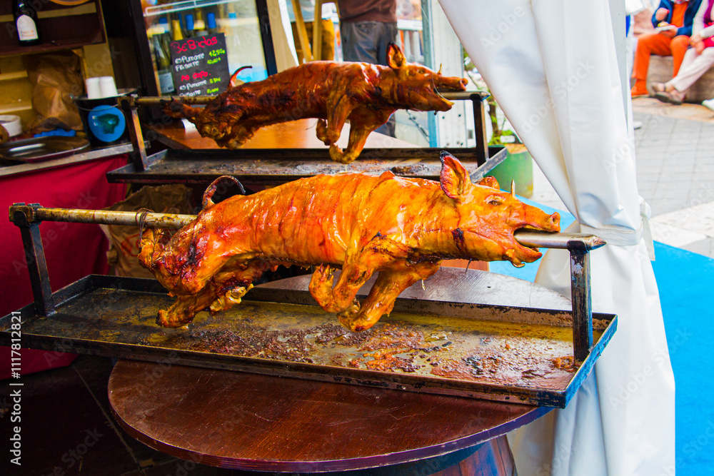 Delicious Whole Roasted Pig on a Spit at a Vibrant Street Food Market ...
