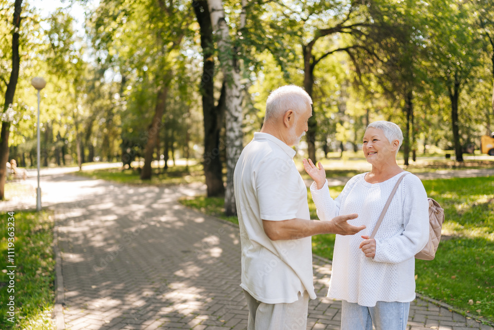 Handsome bearded elderly man gesturing with hands while explaining ... Handsome bearded elderly man gesturing with hands while explaining ...