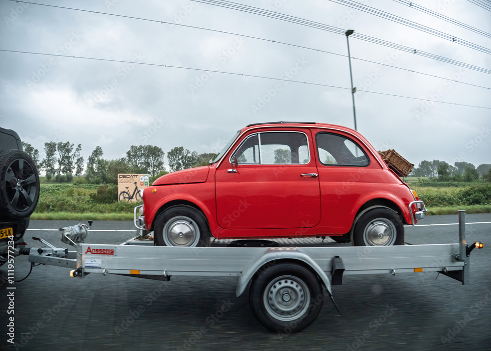 Den Helder, Netherlands - Aug 24, 2024: A classic red Fiat 500 on a ...