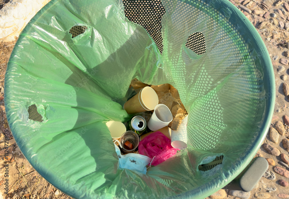 Wastebasket for Garbage and food waste on city Spain street. Plastic ...
