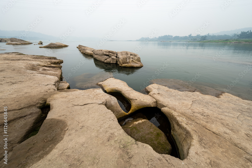 Pothole landforms on the Yangtze River. Located in Qilin Square, Luzhou ...