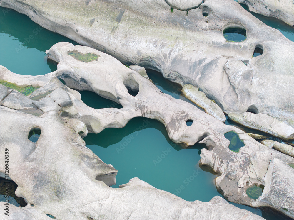 Pothole landforms on the Yangtze River. Located in Qilin Square, Luzhou ...