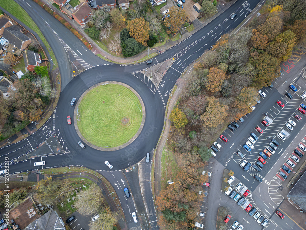 Aerial view of a typical, large roundabout in Britain. Seen close to a ...