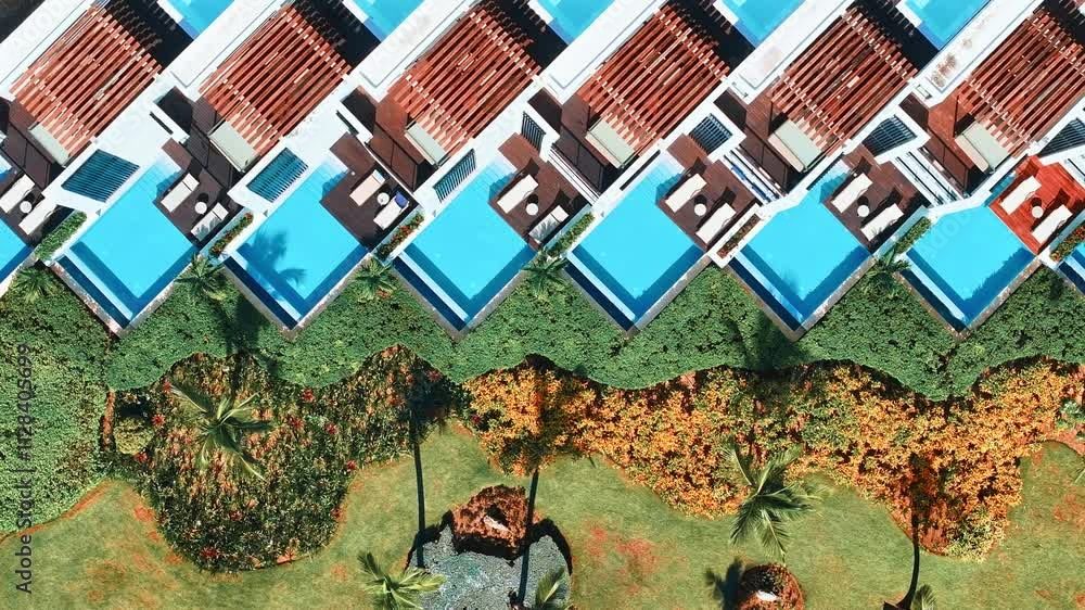 4K video above the swimming pools in a luxury hotel. Holidays, outdoor ...