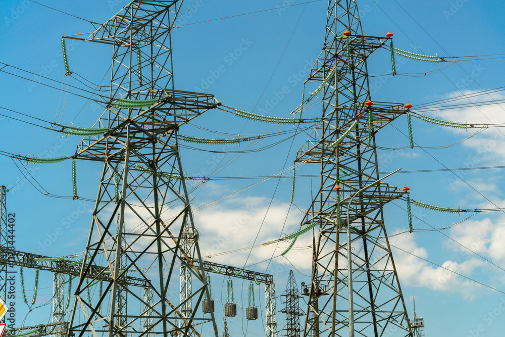 High voltage towers with sky background. Power line support with wires ...