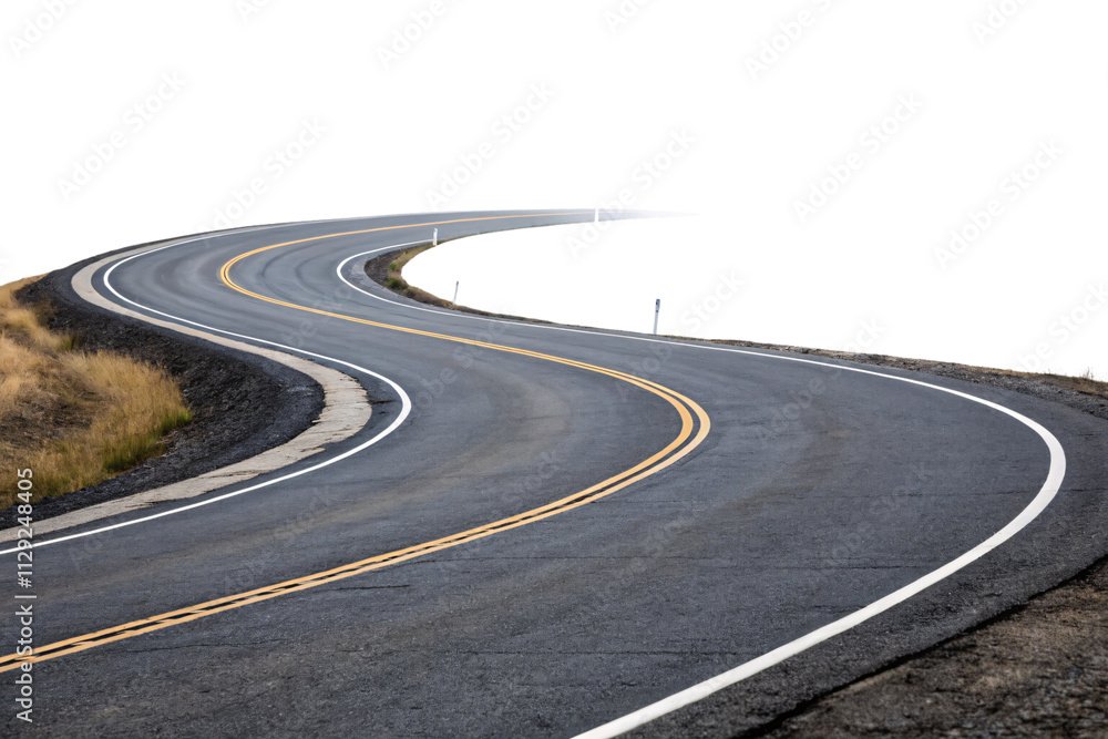 Gentle highway bend crosses dry terrain with faint roadside vegetation ...