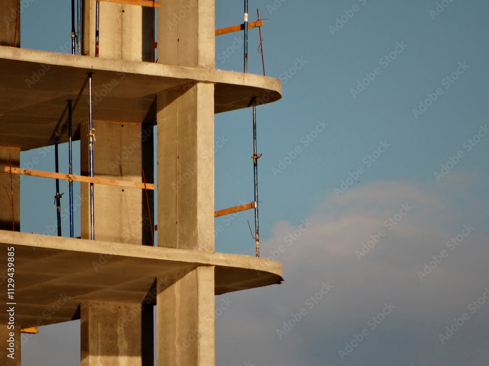 Image shows a construction site with concrete structures foundations ...