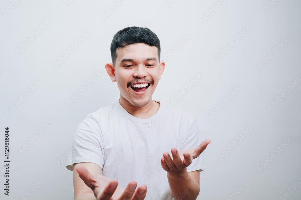 Poster Joyful Young Man with Open Hands Against White Background A ...