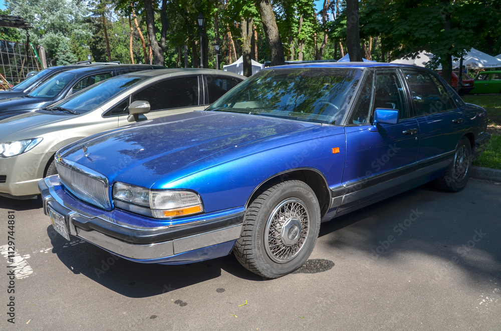 Blue luxury sedan 1991 Buick Park Avenue that exemplifies American ...