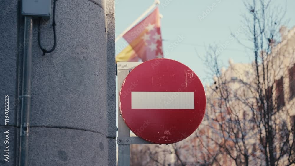 A prominent no-entry sign restricts vehicle access to central areas of ...
