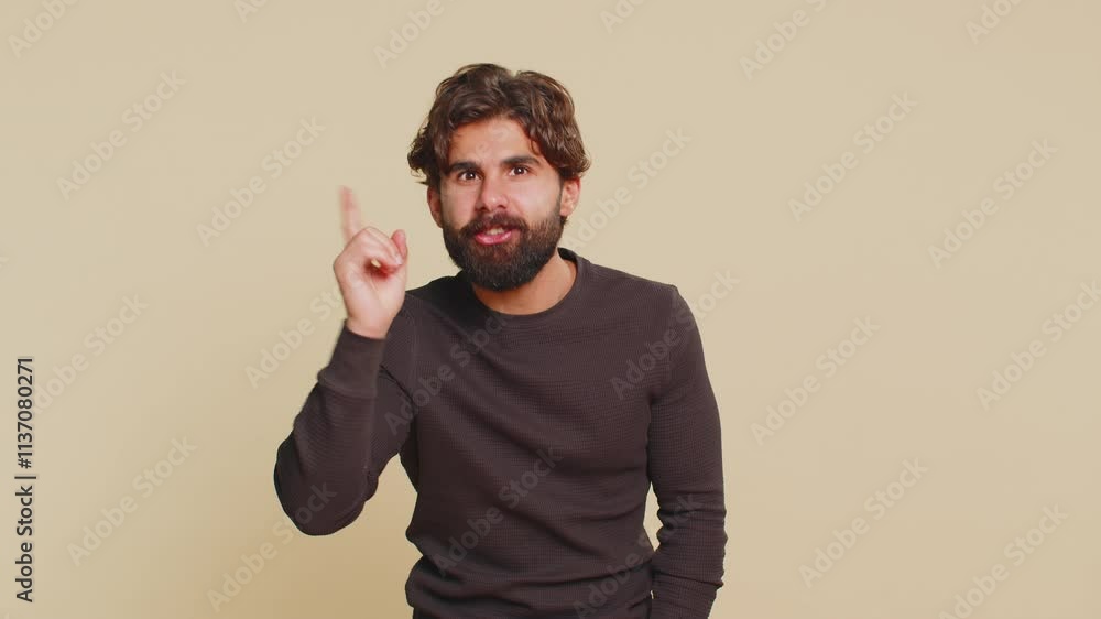 Lebanese man shakes finger, dislike and saying No, be careful, scolding ...