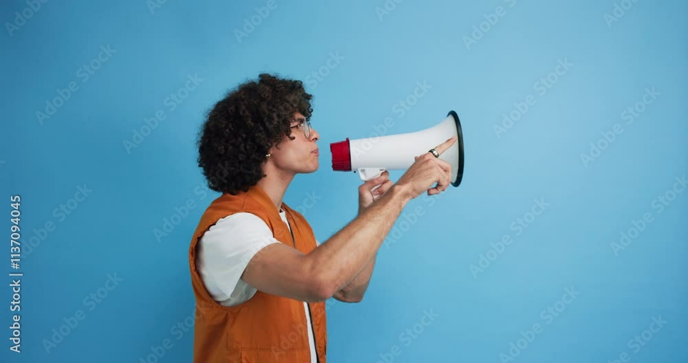 Man, bullhorn and protest with fist in studio, shouting and voice ...