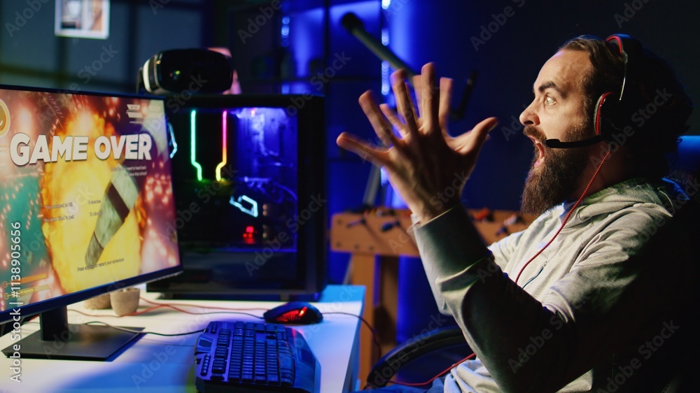 Annoyed man shouting after losing while playing online multiplayer ...