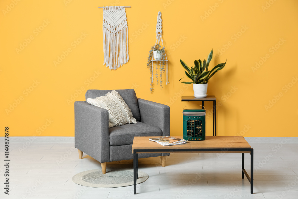 Póster Portable table fan with humidifier on coffee table, armchair and ...