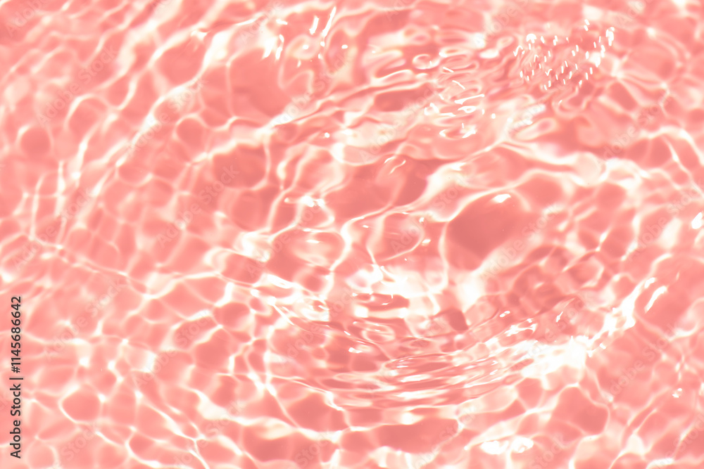 Pink water bubbles on the surface ripples. Defocus blurred transparent ...