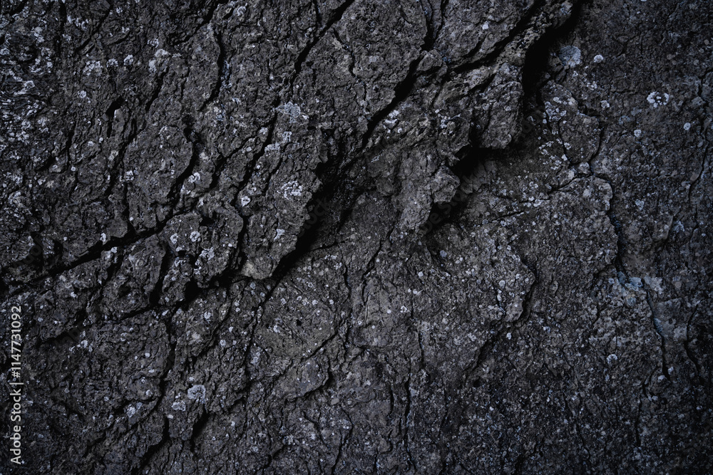 Dark stone texture background. Close up of limestone rock wall. Clay ...
