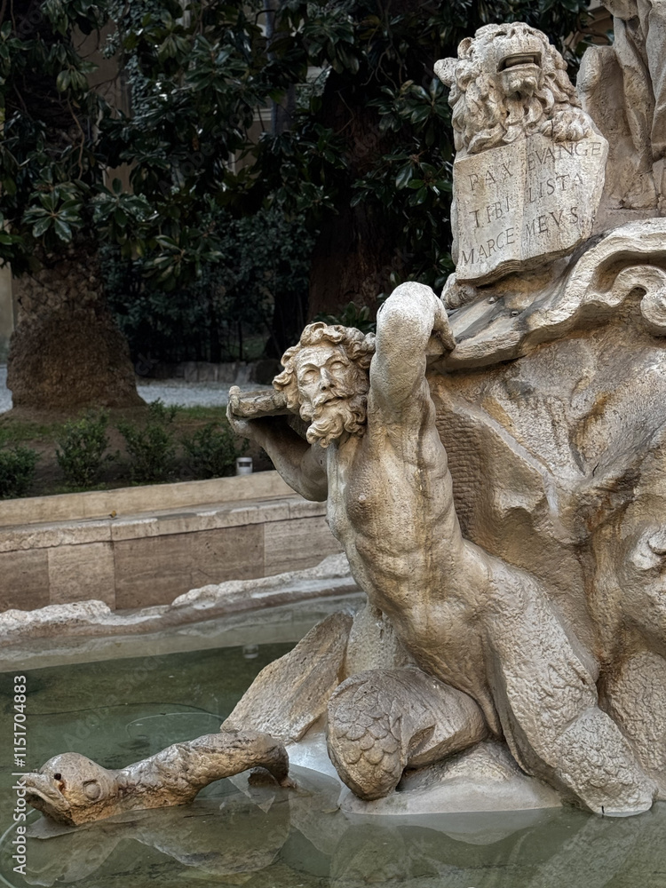 Sculpture of a muscular merman supporting a stone feature with a lion's ...