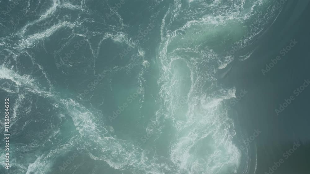 A mesmerizing footage of fast-flowing water creating intricate patterns ...