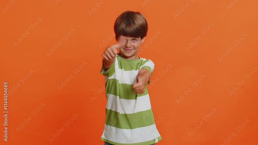 Like. Happy young preteen child boy kid looking approvingly at camera ...