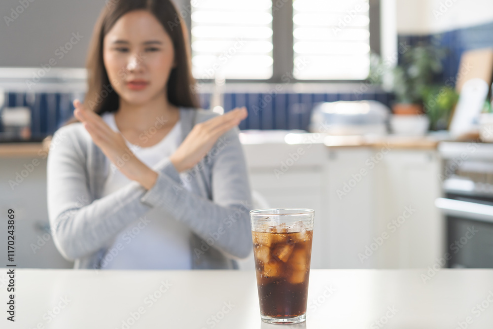 Diet, Dieting. Attractive asian young woman, girl push out cold cola ...