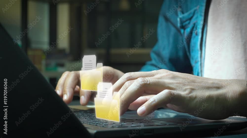 Close-up of hands typing on a laptop with holographic digital documents ...