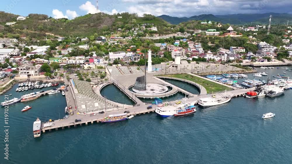 Labuan Bajo Marina port and waterfront with lighthouse. Badjo, Flores ...