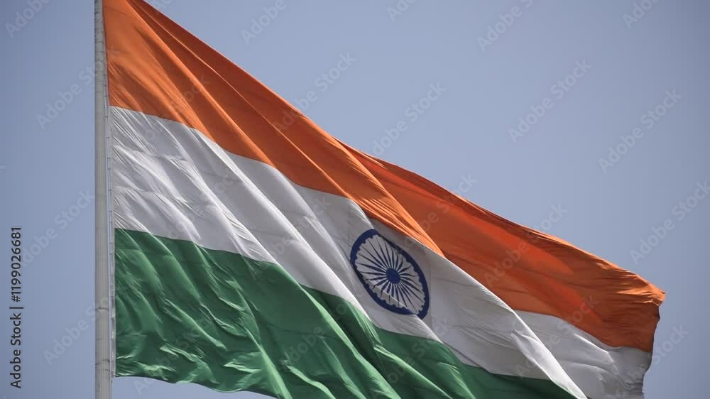 India flag flying high at Connaught Place with pride in blue sky, India ...