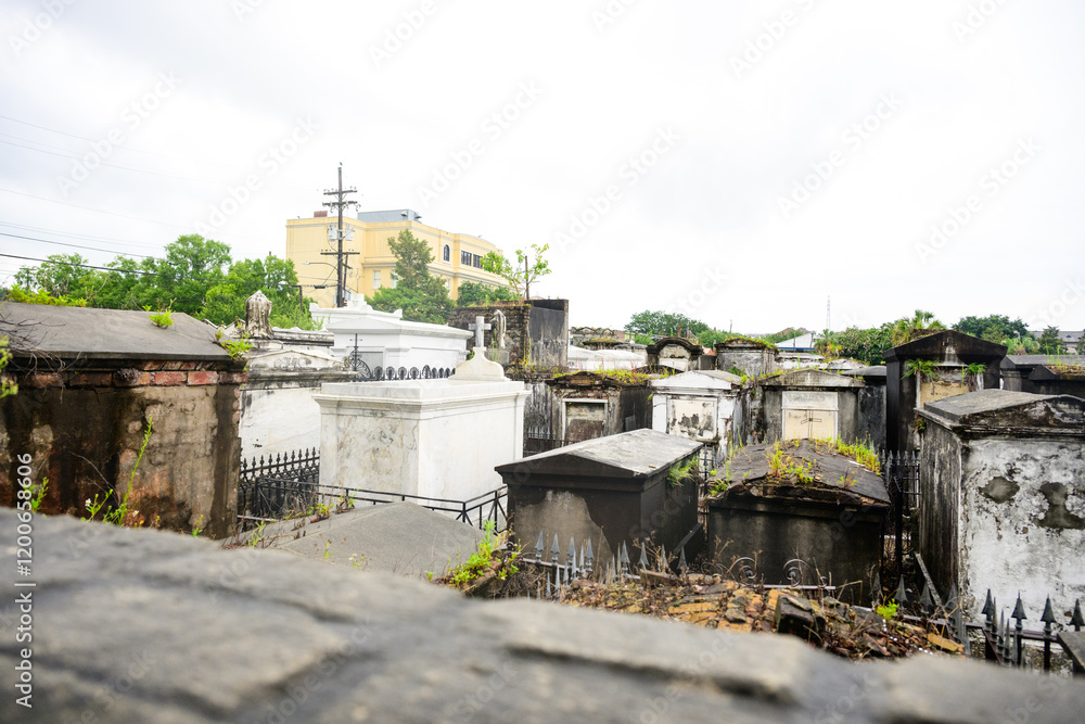 Poster Cemetery full of old weathered concrete tombs and tombstones new ...