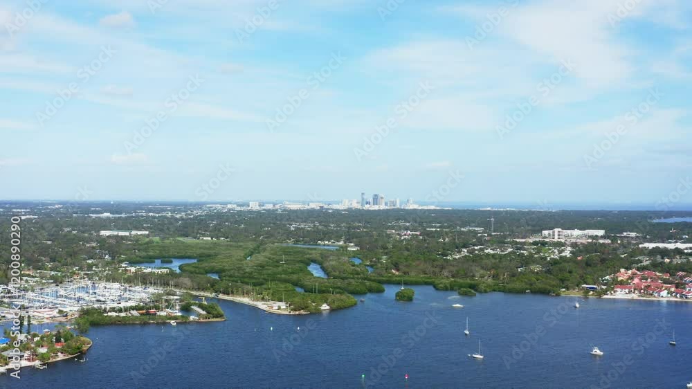Experience the breathtaking beauty of Boca Ciega Bay from above, as a ...