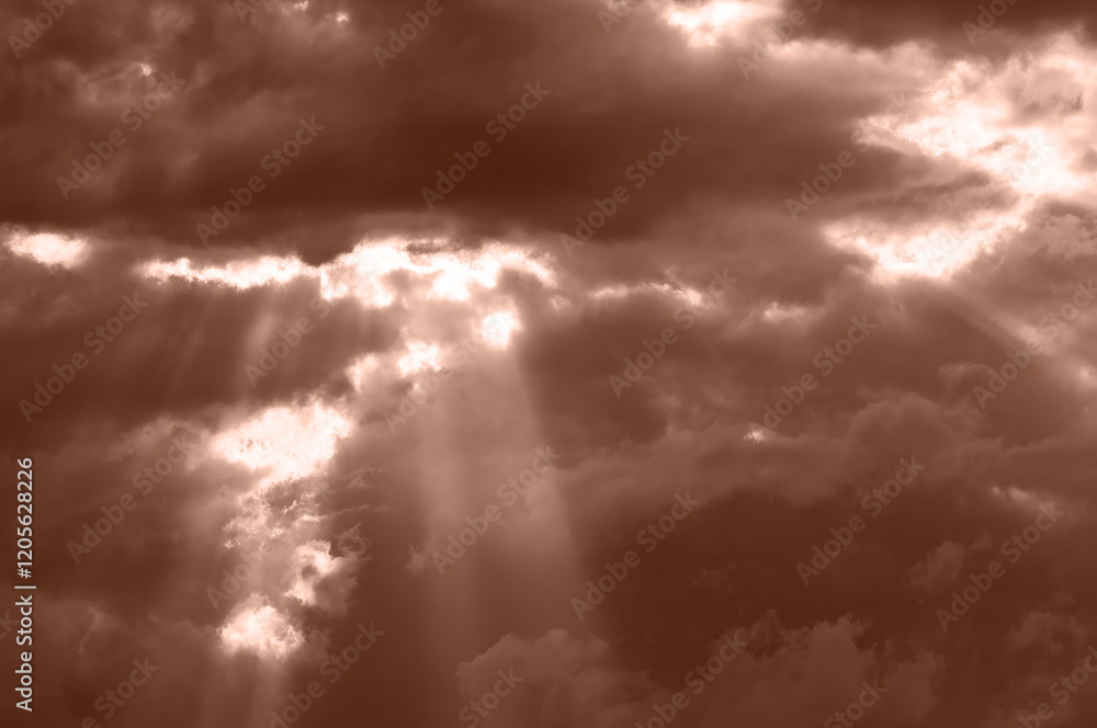 Poster Sepia-toned sky with dramatic crepuscular rays, creating a moody ...