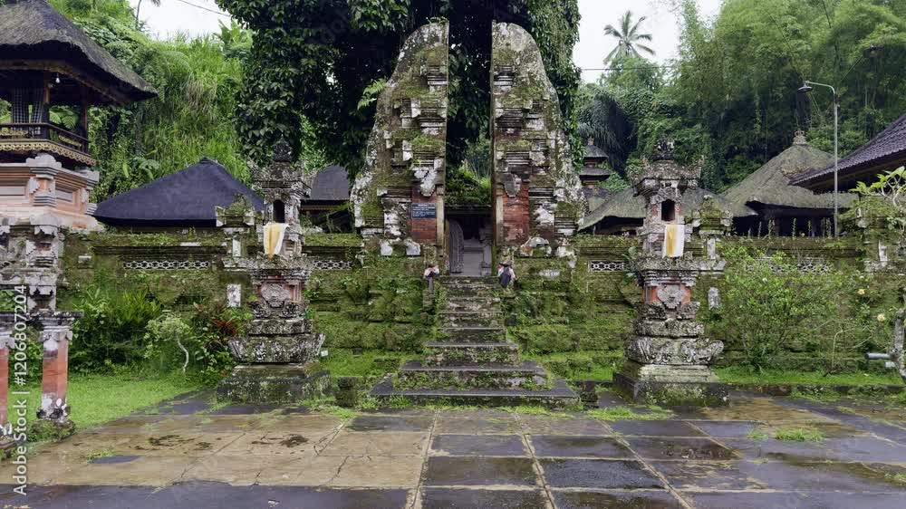 Bali’s Holy Water Temple with Koi Fish Ponds A peaceful Balinese temple ...