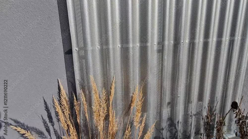 building is lined with square panels. metal sheet wall cladding with ...