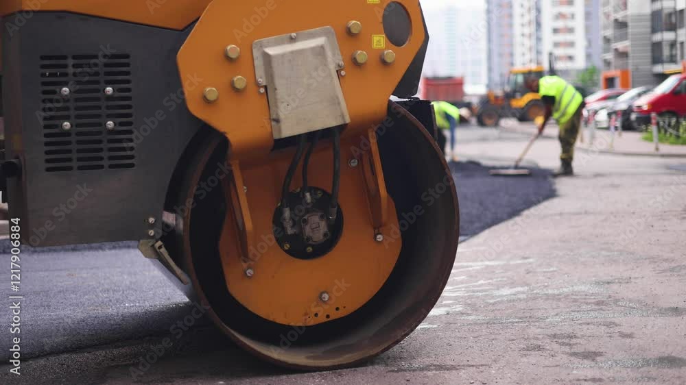 Roadworks, process of asphalting, blacktopping and paving new road ...