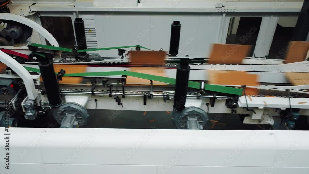 Cardboard factory, equipment, production workshop. Modern conveyor line ...