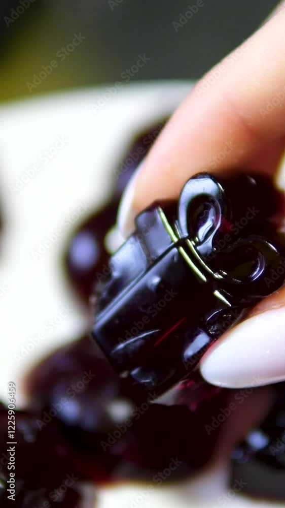 jelly candies Hand grabbing candy Top down footage of hands grabbing ...