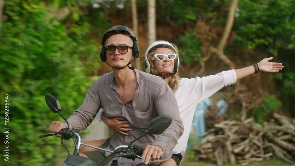 Man rides on motorbike. Woman hugs boyfriend, shouts, opens arms. Ride ...