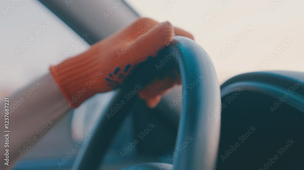 Close-Up of Worker’s Hand Gripping Steering Wheel in Orange Glove ...
