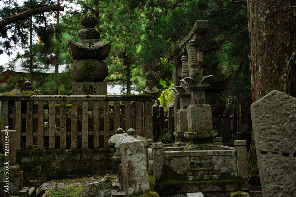 Poster Ancient cemetery at sunset inside a forest, on Mount Koya, Okuno ...